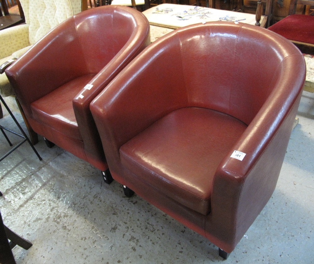 Lot 581 - Pair of modern red leather tub chairs. (2)